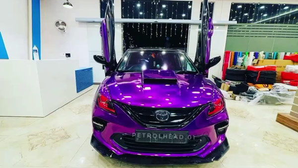 ലംബോർഗിനി സിസർ ഡോറുകളുമായി Modified Toyota Glanza - Malayalam DriveSpark